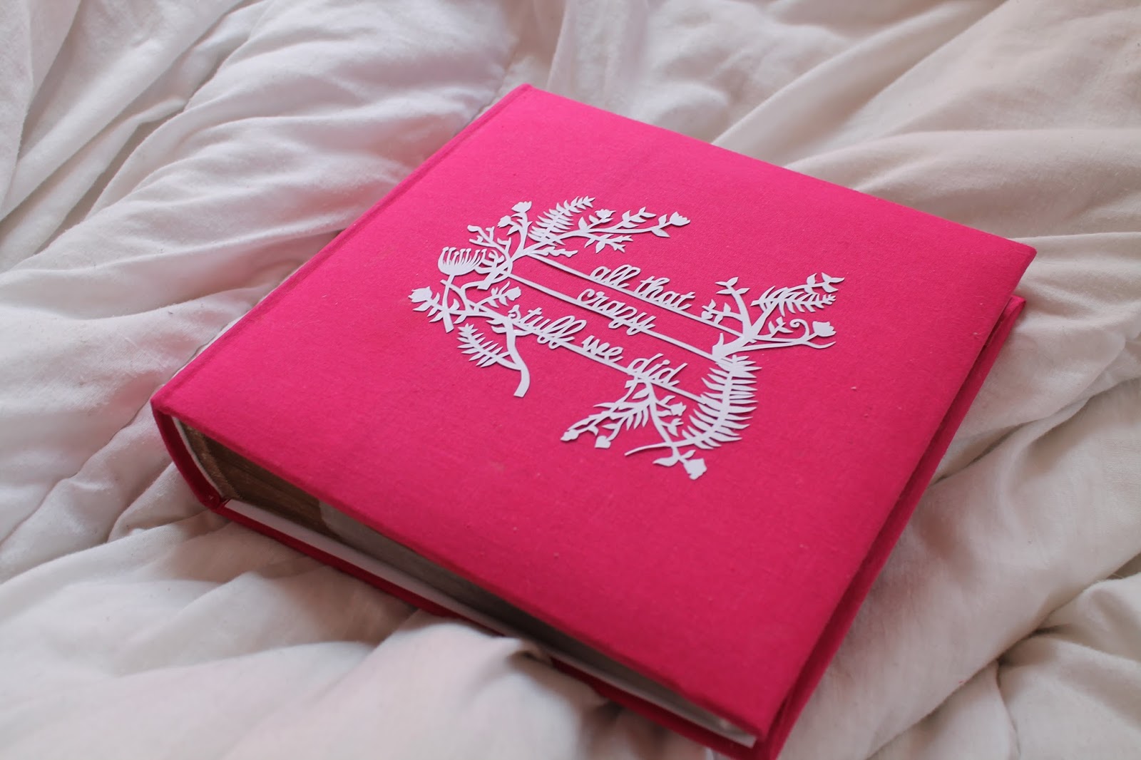 20. Push your papercutting onto your album and allow it dry fully.