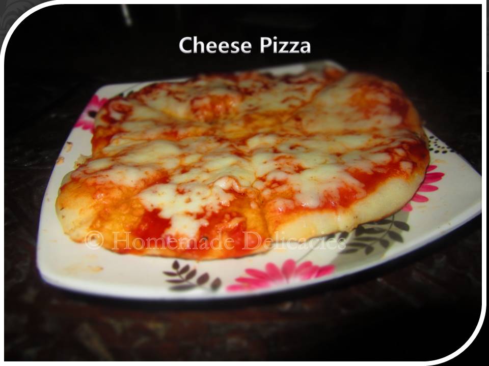 Homemade Delicacies: Cheesy Homemade Pizza