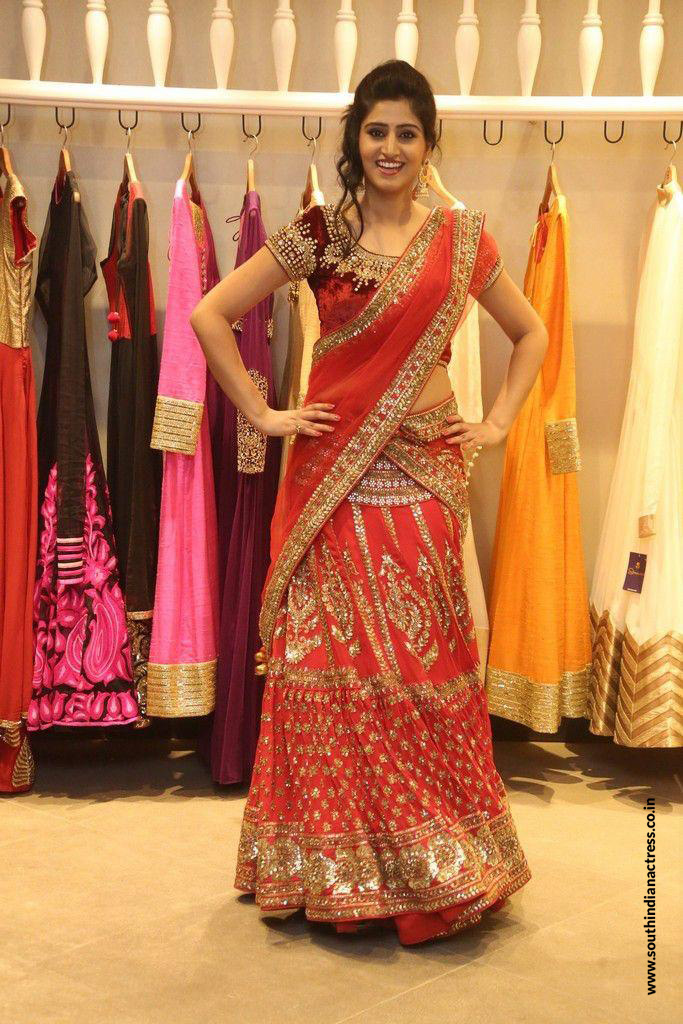 Varshini Sounderajan in red half saree stills - South Indian Actress