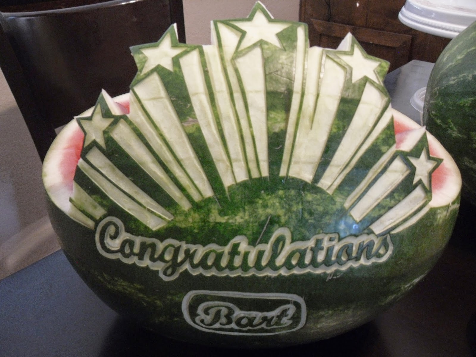 Fruit Art Arrangements: Watermelon fruit bowl for graduation.