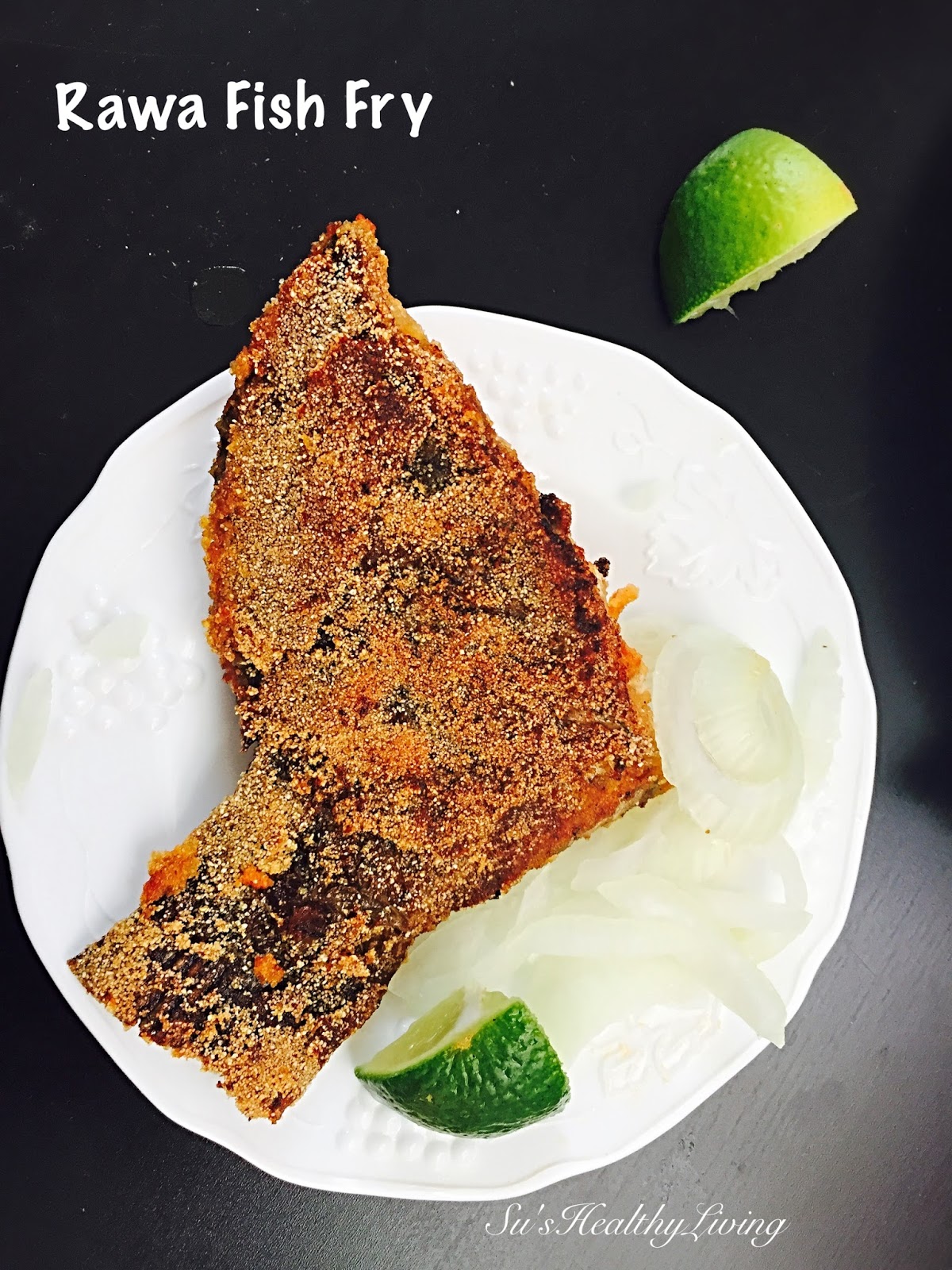 Serve hot amongst onion rings too lemon wedges.