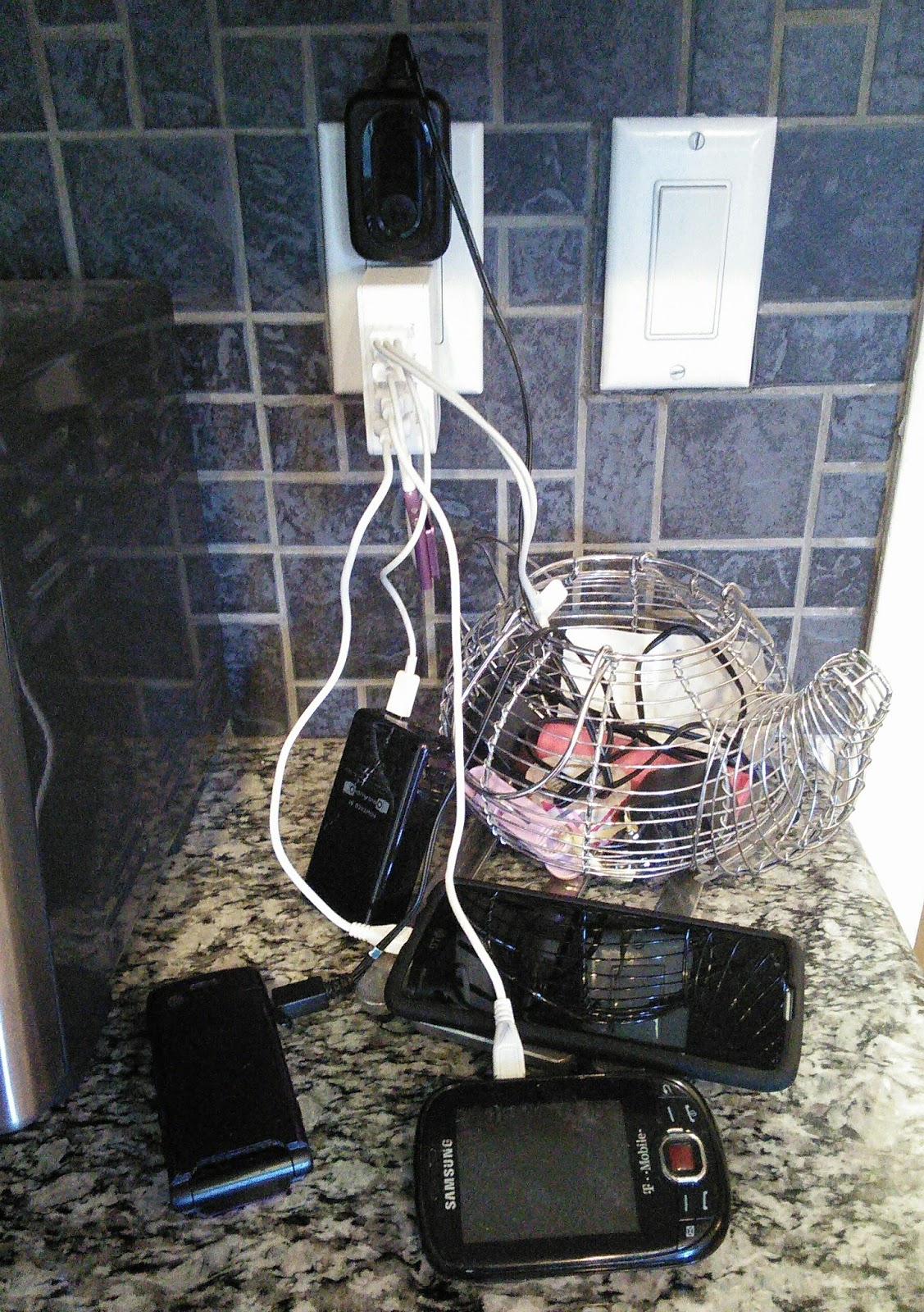 Look at this! I am charging five devices with just one outlet!