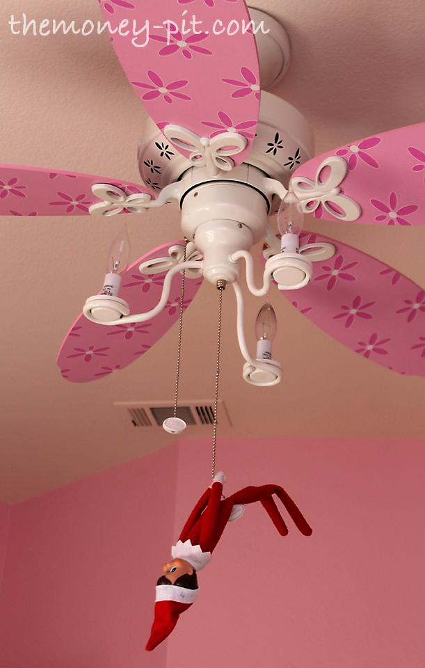 Elfie trying to blend in with some snowmen: