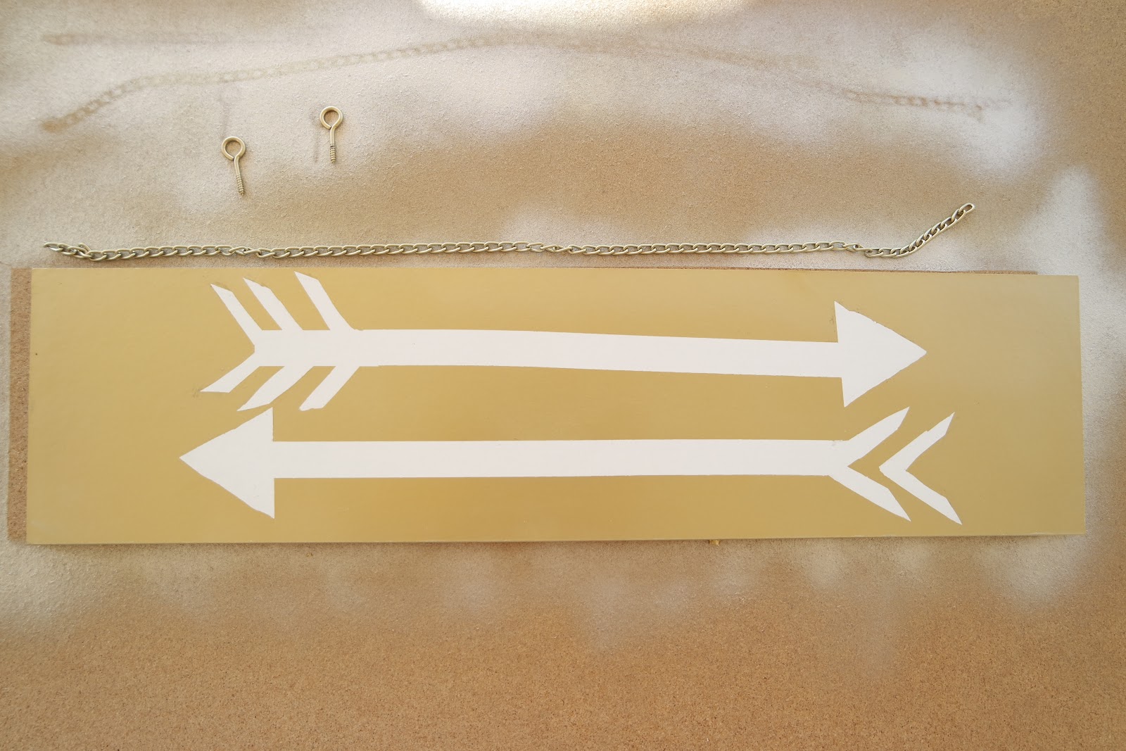 Angie Kariofilli: DIY Arrow Sign Art