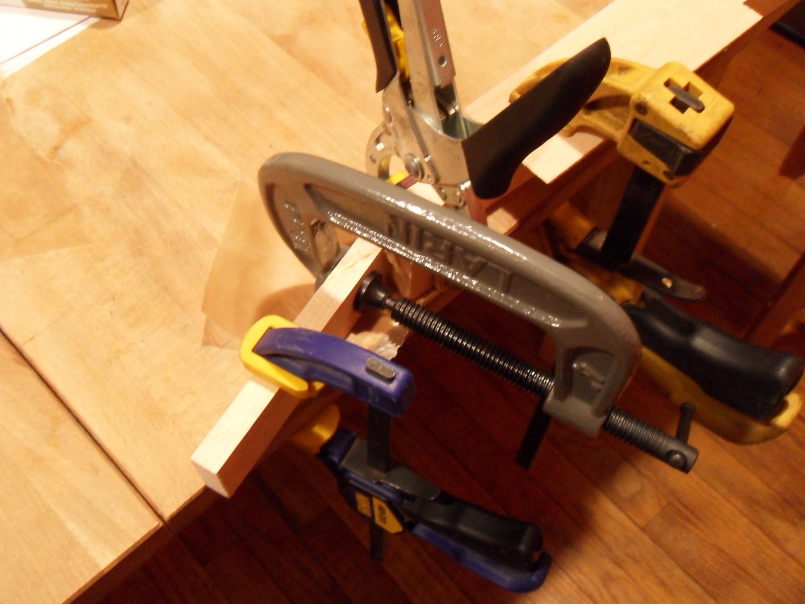 making a four string neck (part 2) cutting angles and guing fretboard ...