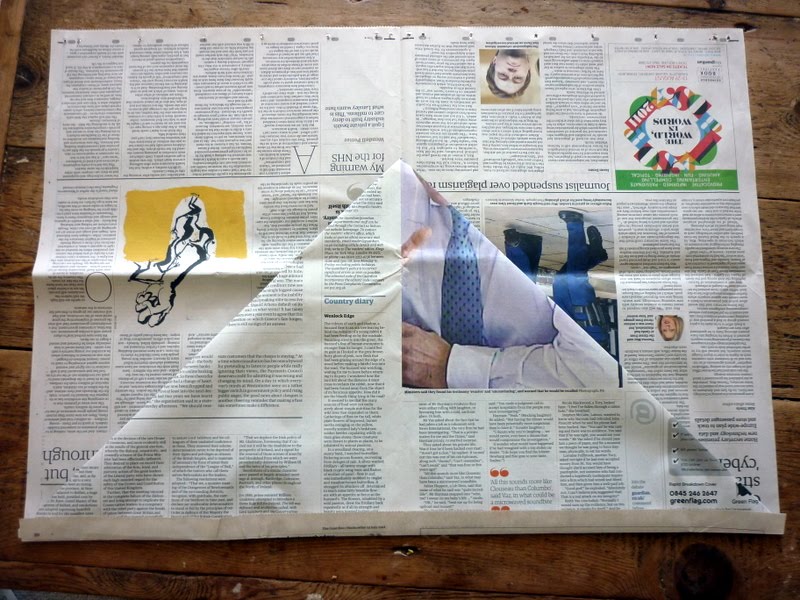 sixty one A: Recycled paper helmet