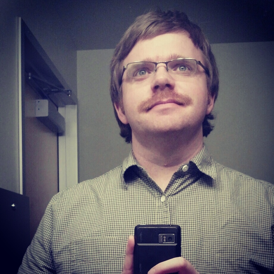 myke lewis: of mustaches and transgender trench coats