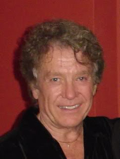 Michael Cole (1945-)