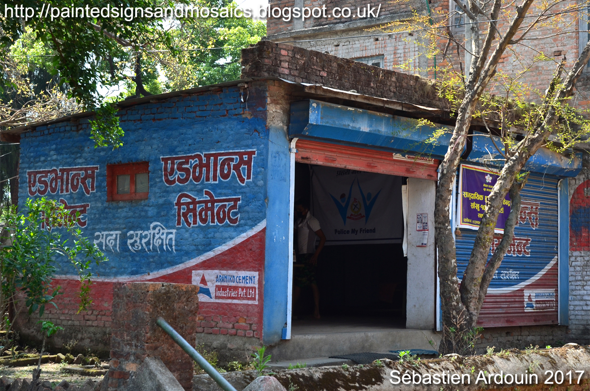 Painted signs and mosaics: Araniko Cement, Sankhu, Nepal