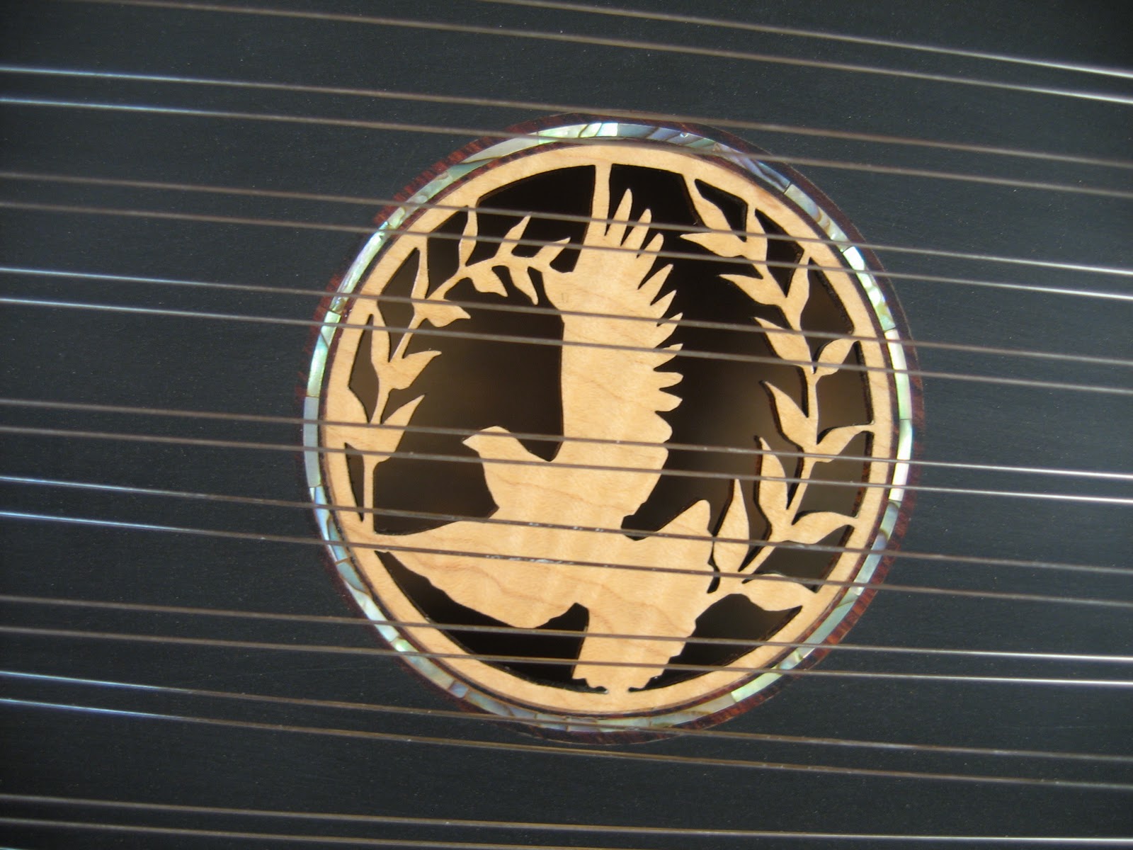 James Jones Instruments: Sound Hole Designs