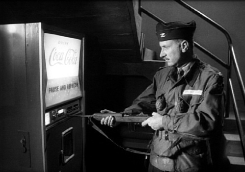 man shoots change machine ~ Crunchy Views