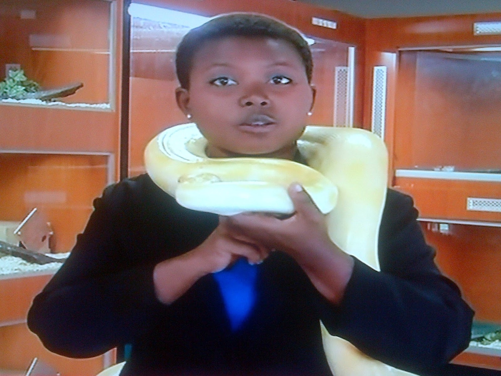 Tv With Thinus Phakamile Hlubi On The Enca Does A Glenda Kemp Pats A Python Around Her Neck As