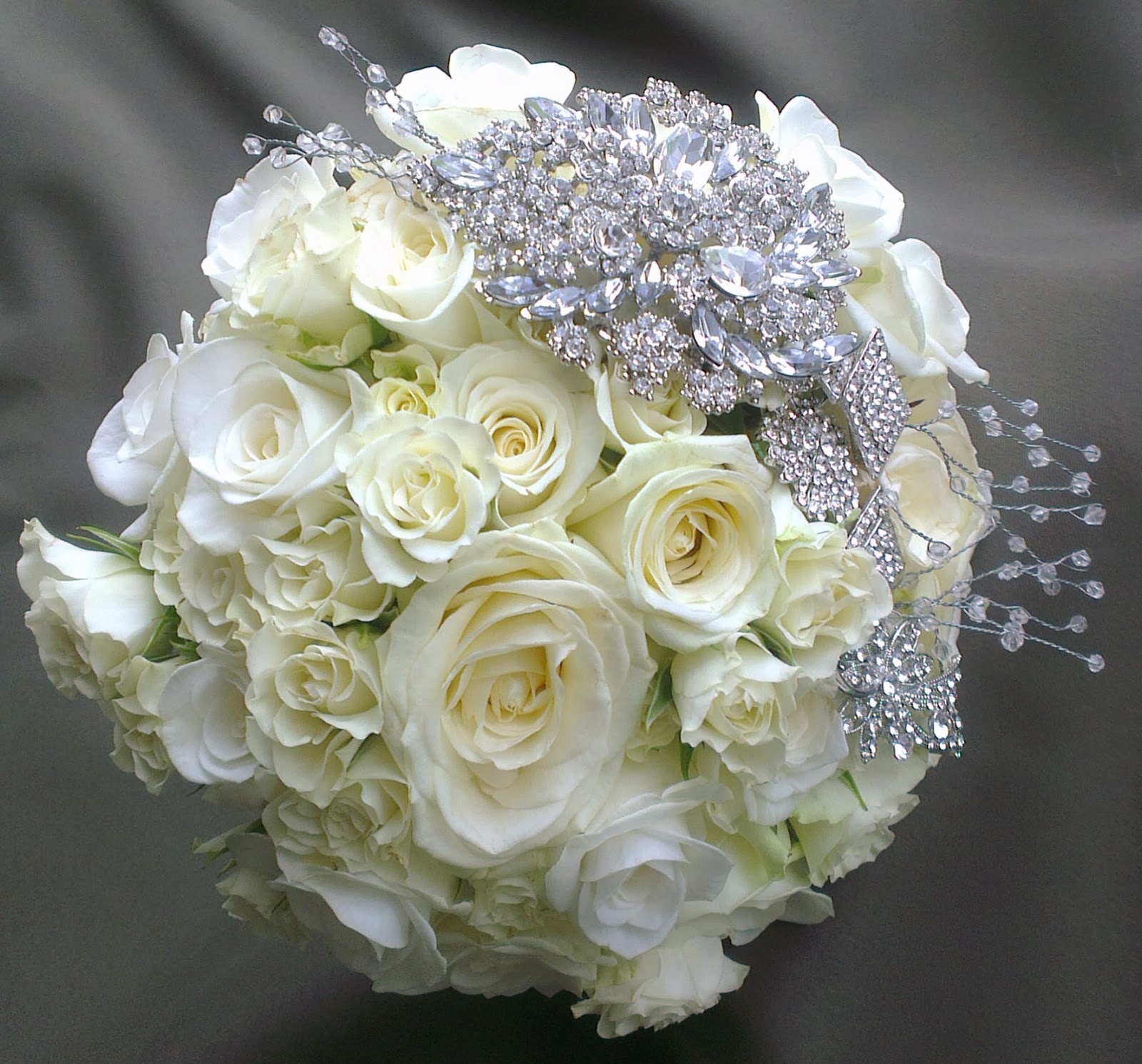 Sandra's Flower Studio.: White rose wedding with extra bling