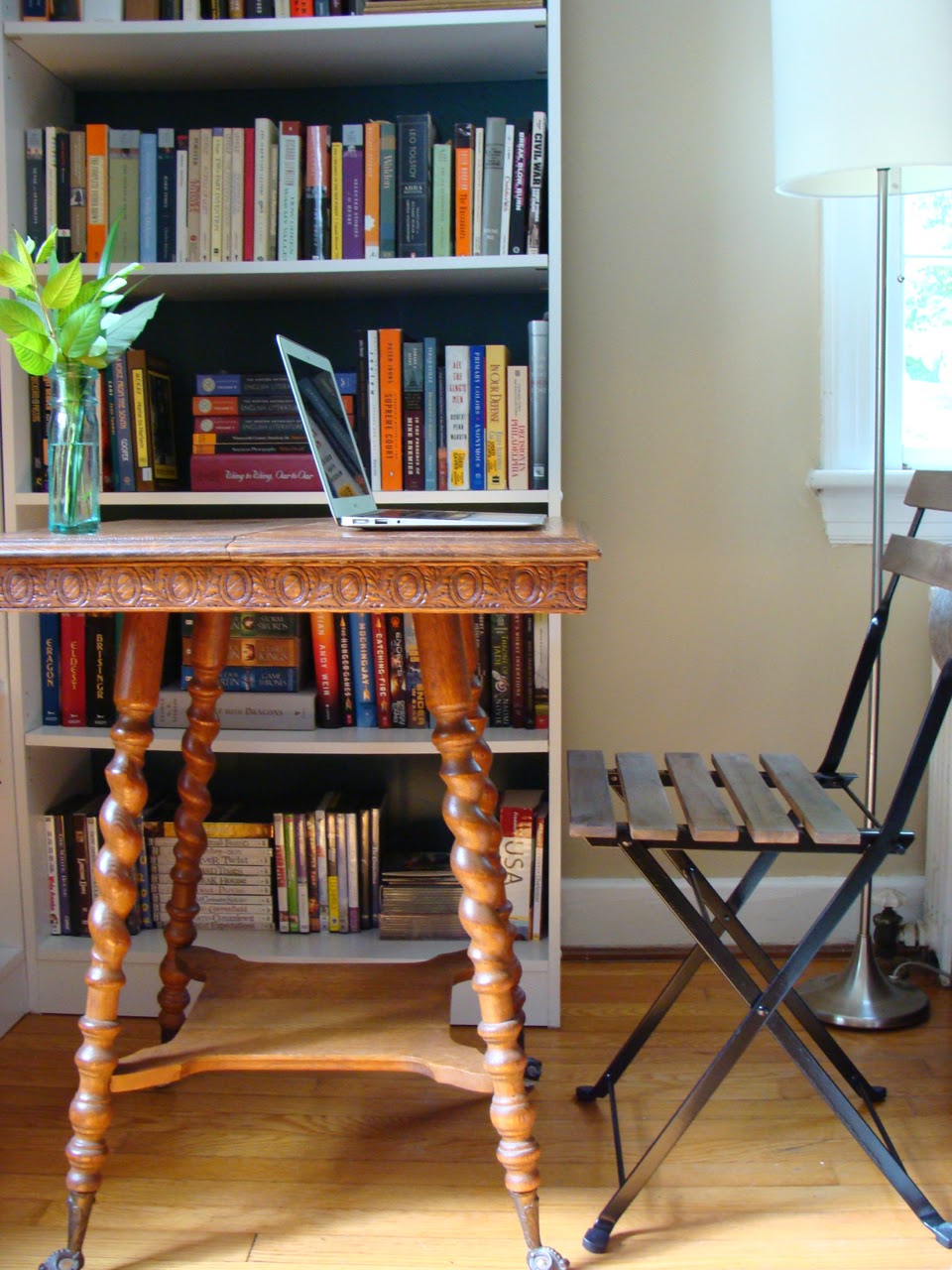 Something Ivory: A Writing Nook Among Bookcases