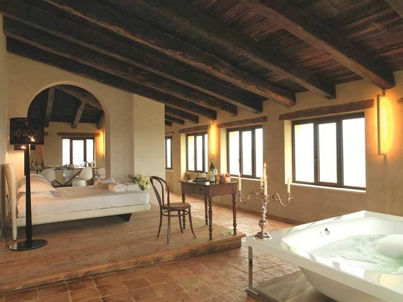 ESTILO RUSTICO: Castello di Semivicol, un Hotel Rustico