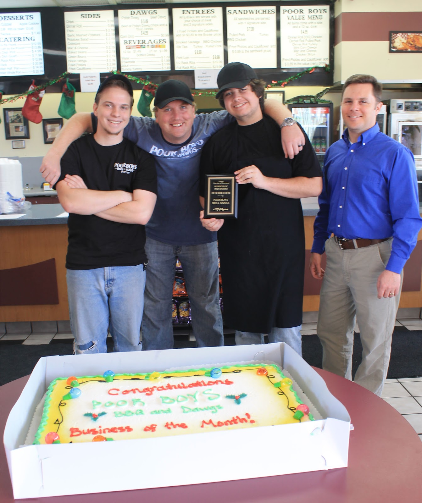 The Payson Chronicle: Chamber Serves Poor Boys Business of Month Honor