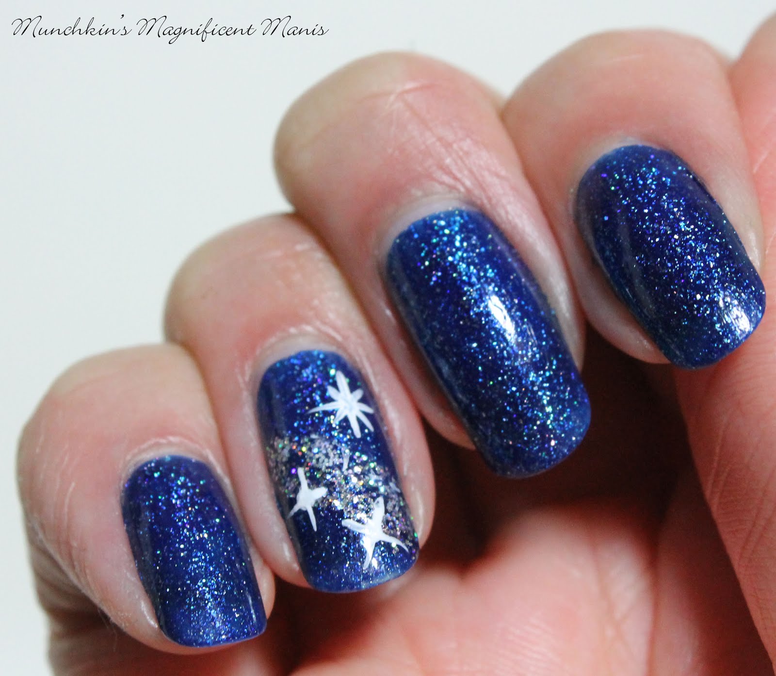Munchkin’s Magnificent Manis: Starry Night Sky- Star Nail Design