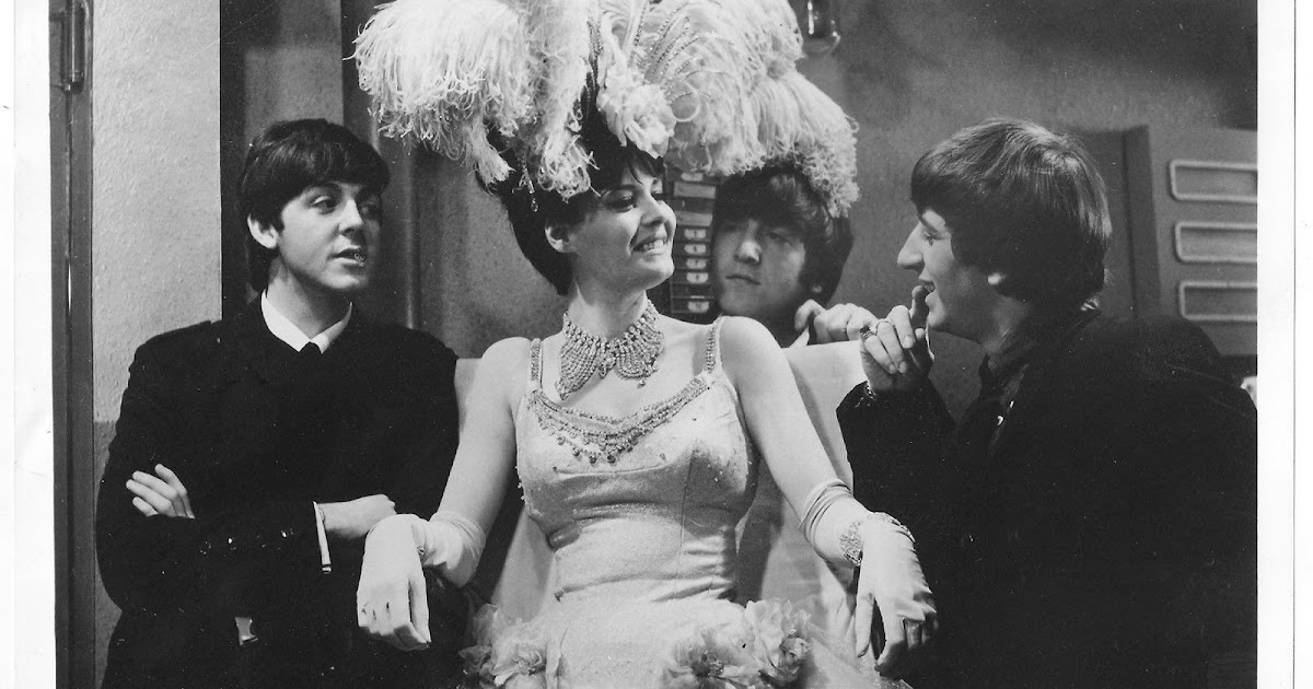 Meet the Beatles for Real: Showing her stamp collection