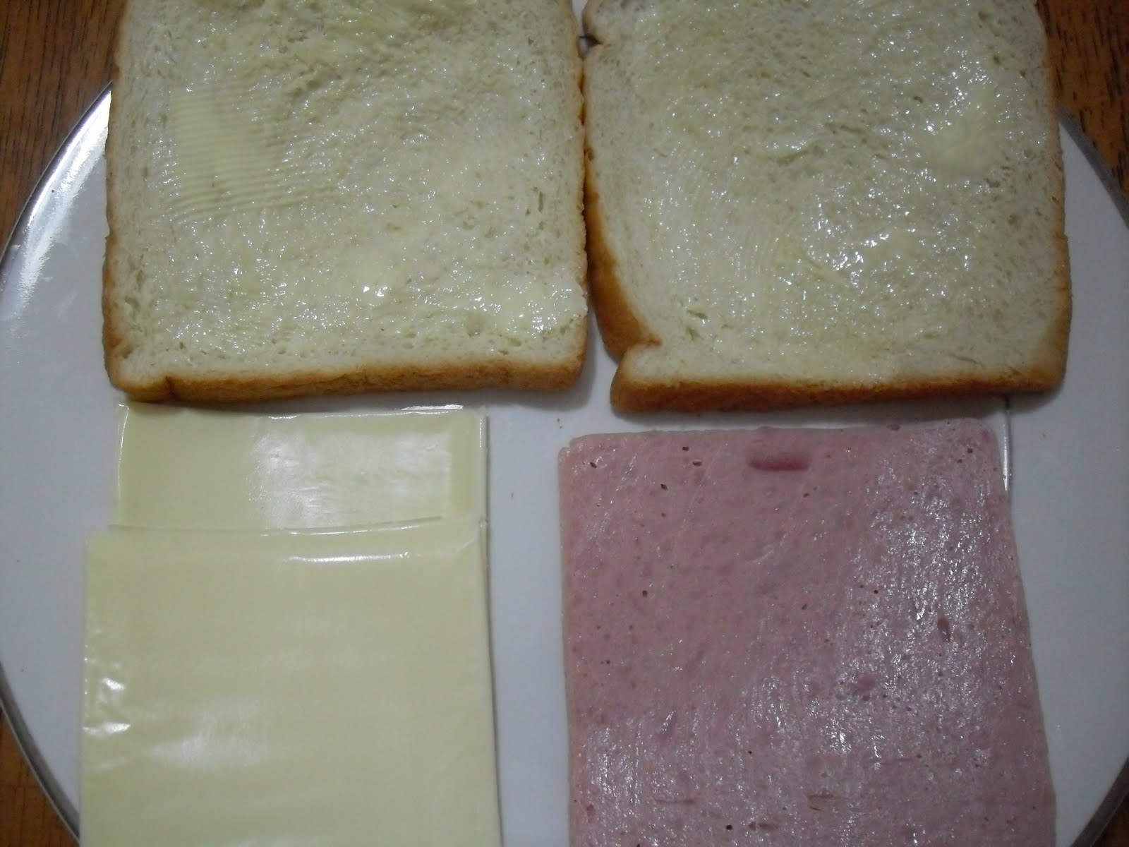 Toasted Bread With Turkey Ham And Cheese