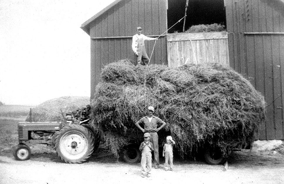Across The Fence: The Art of Stacking Hay Bales