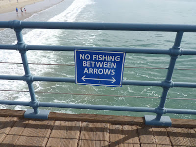 Usability and UX Not Optional: Sign of the month: No fishing between arrows