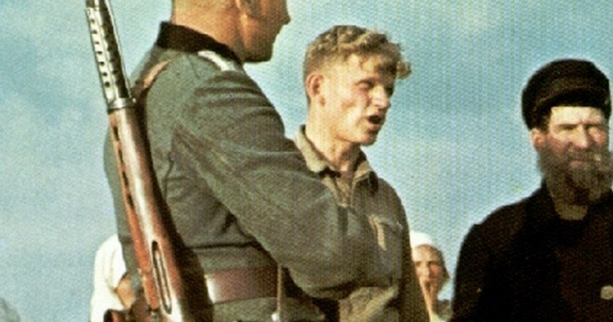 WORLD WAR II BIBLE: German Soldier Amongst Captured Soviet Rifle WORLD WAR II BIBLE: German Soldier Amongst Captured Soviet Rifle
