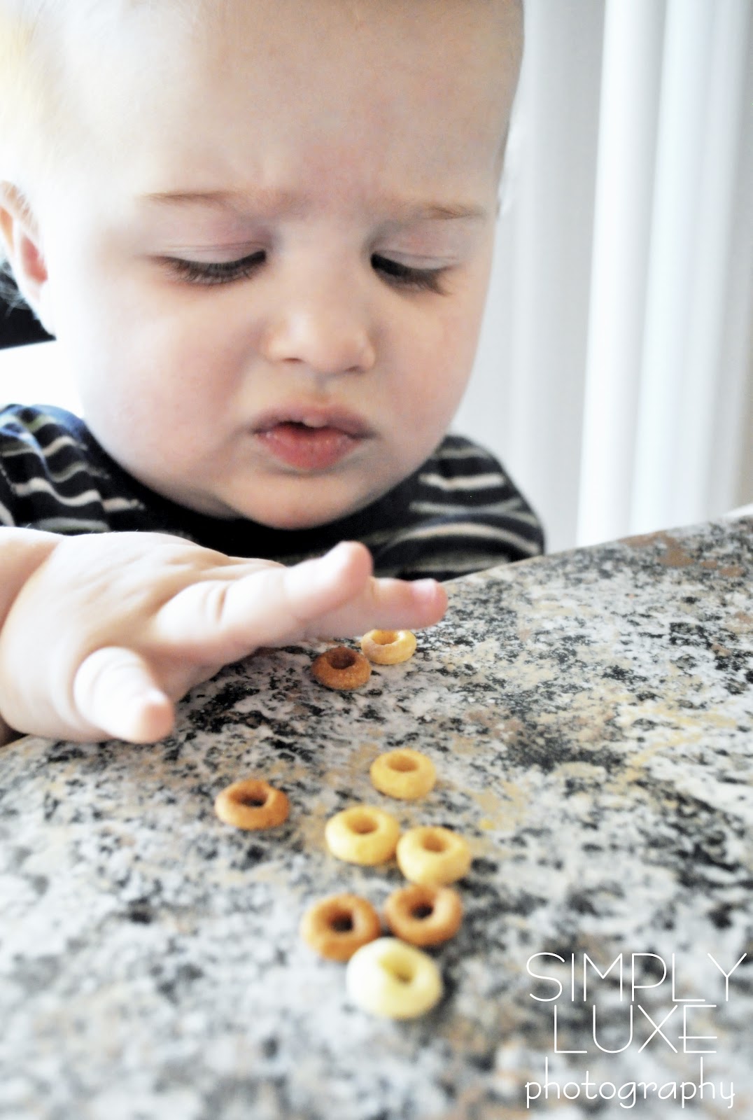 Simply LUXE Photography: Baby boy eating cheerios- Candid Moments