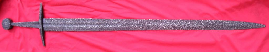 Portable Antiquity Collecting and Heritage Issues: A Sword, a Sword