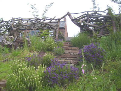 Alister Neville: Garden steps and woven fence, Hayton, Cumbria