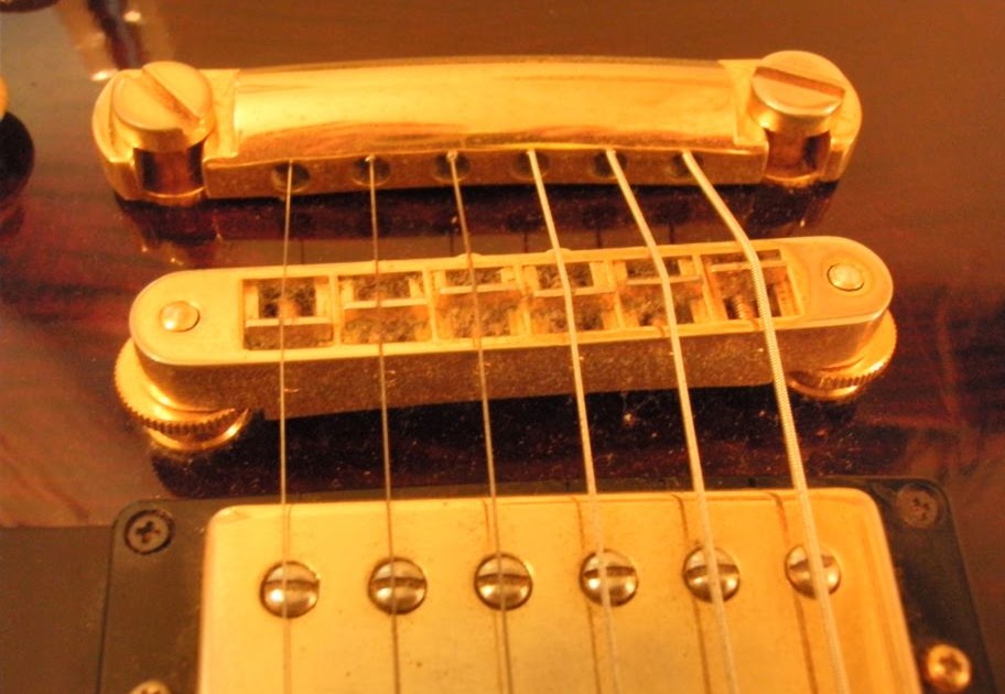 Installing Graph Tech saddles on a Tune-O-Matic bridge | DIY Strat (and ...