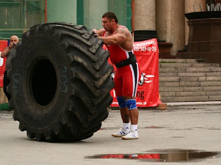 world bodybuilders pictures: mighty bodybuilder is lifting a very big ...