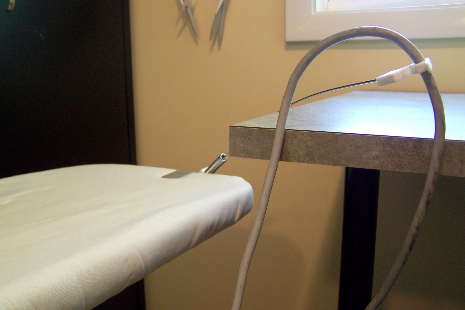 Ironing Board Cord Minder at Theresa Hanson blog