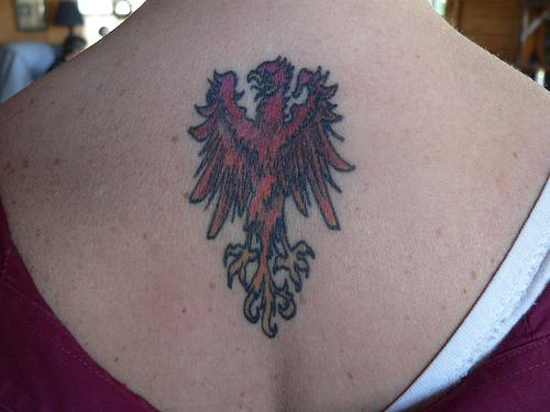 tattoos: Phoenix tattoos symbol of birth