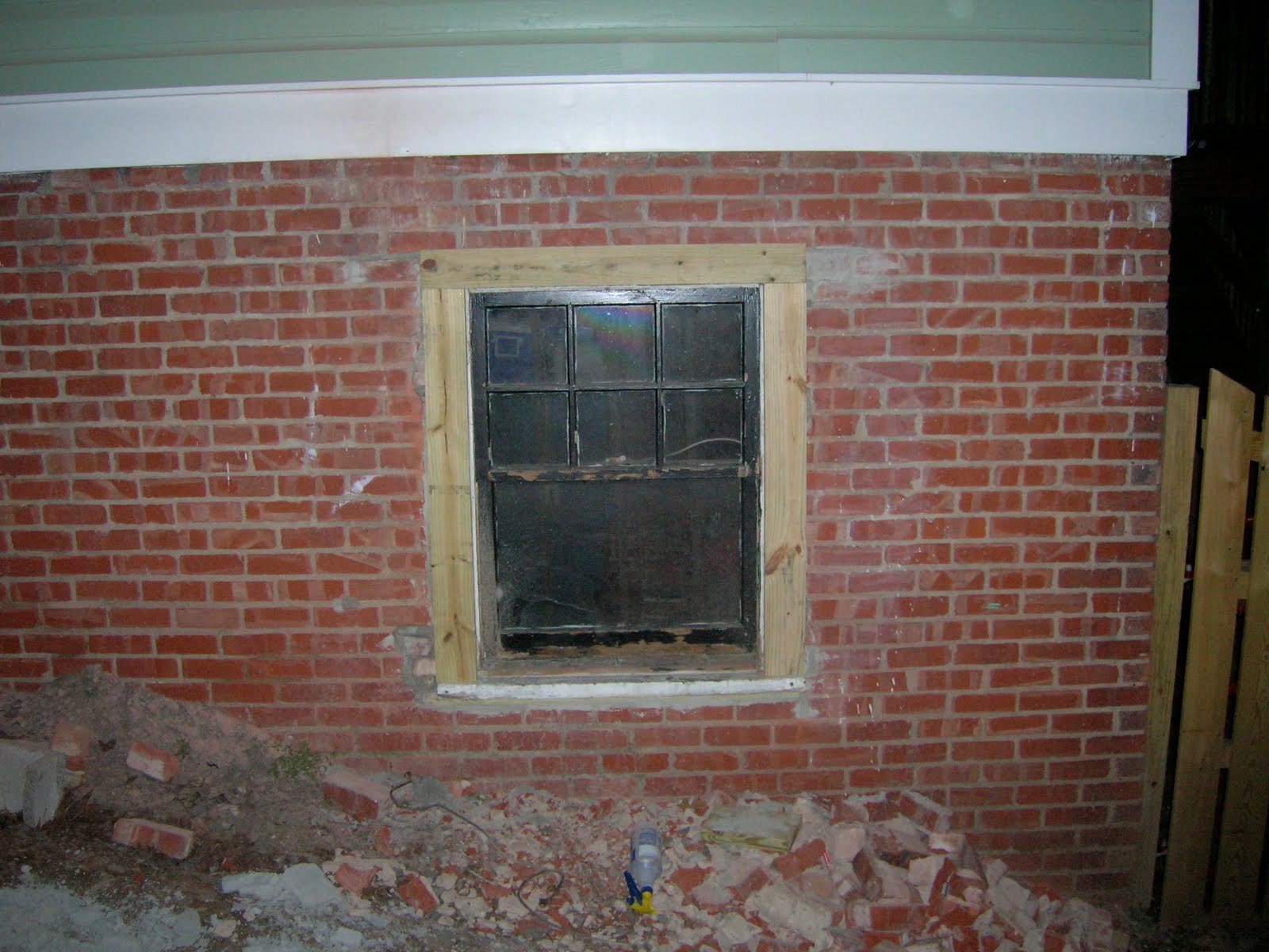 DammanWorks/Carpentry: Salvaged Window Installed in Brick Wall
