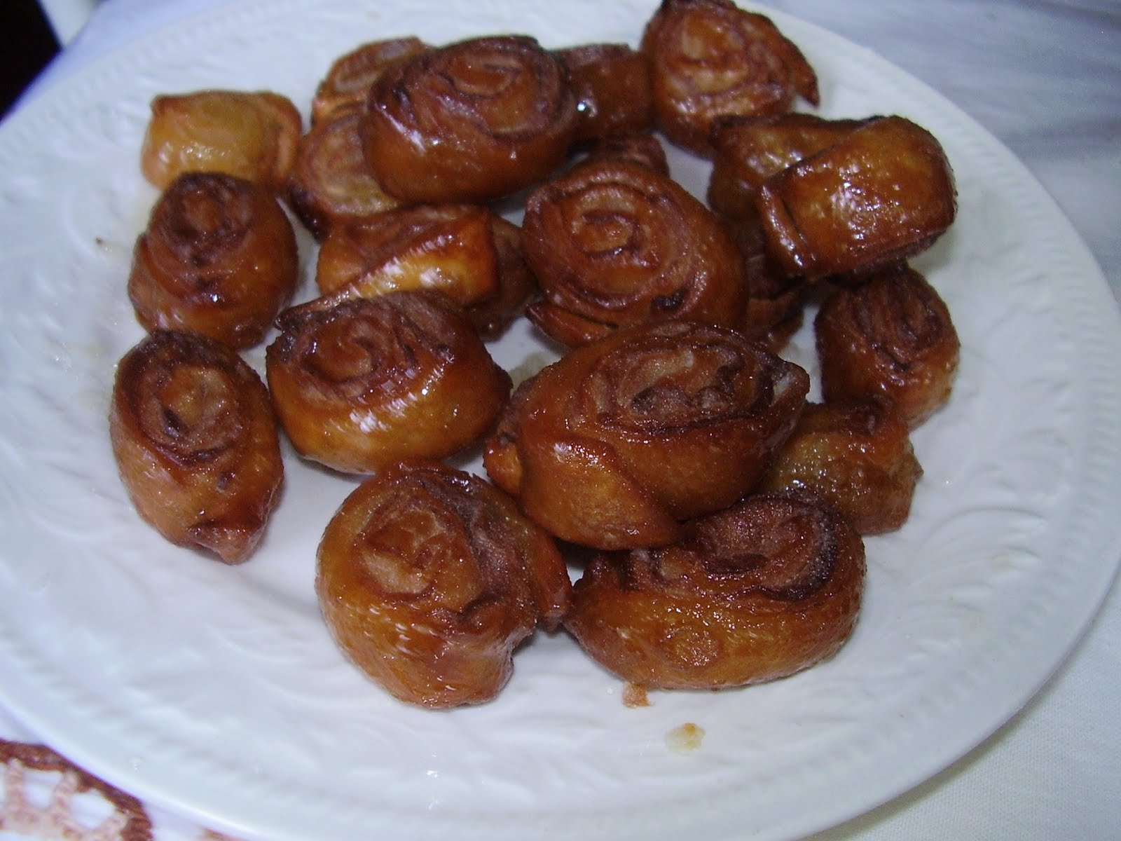MAA ABHIRUCHI: కాజాలు: Kaajaalu- Sweet fried pastry rolls