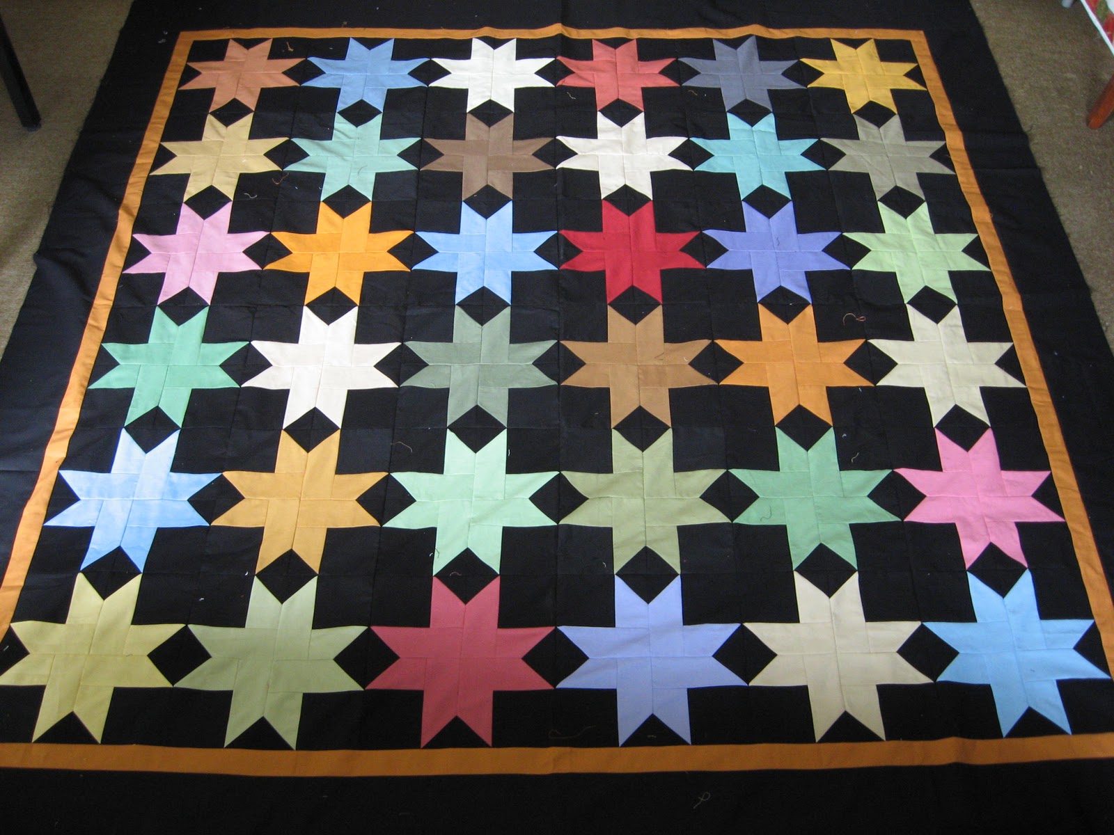 The Sanguine Stitcher: Amish Star quilt top - Completed
