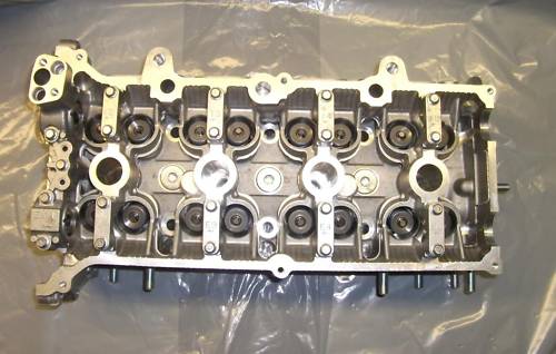 SUZUKI SWIFT: M18A Cylinder Head
