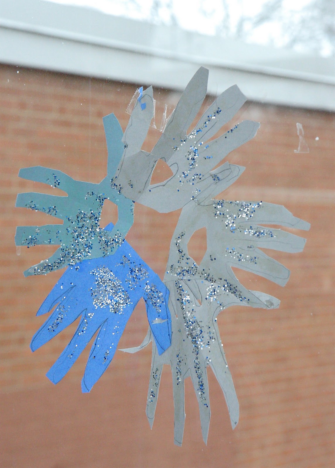 Splish Splash Splatter: Handprint Snowflakes