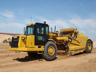 Caterpiller machines: Caterpiler Elevating Scrapers....