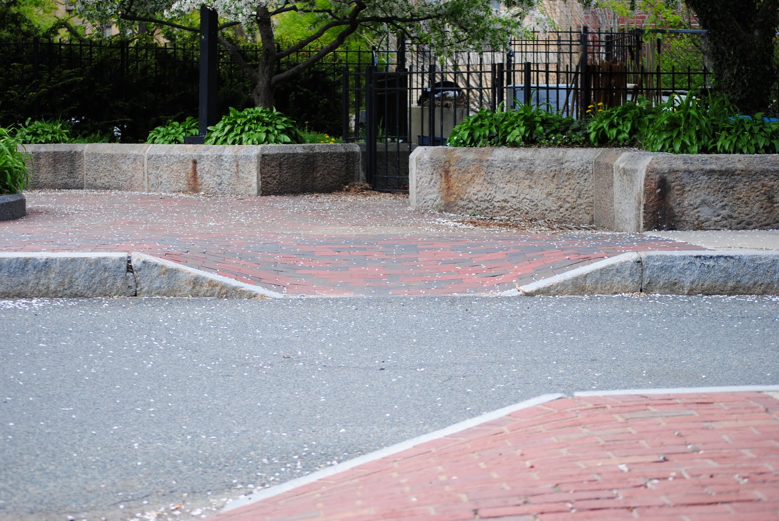Calm Streets Boston: Narrow roadway with high curbs to prevent parked ...