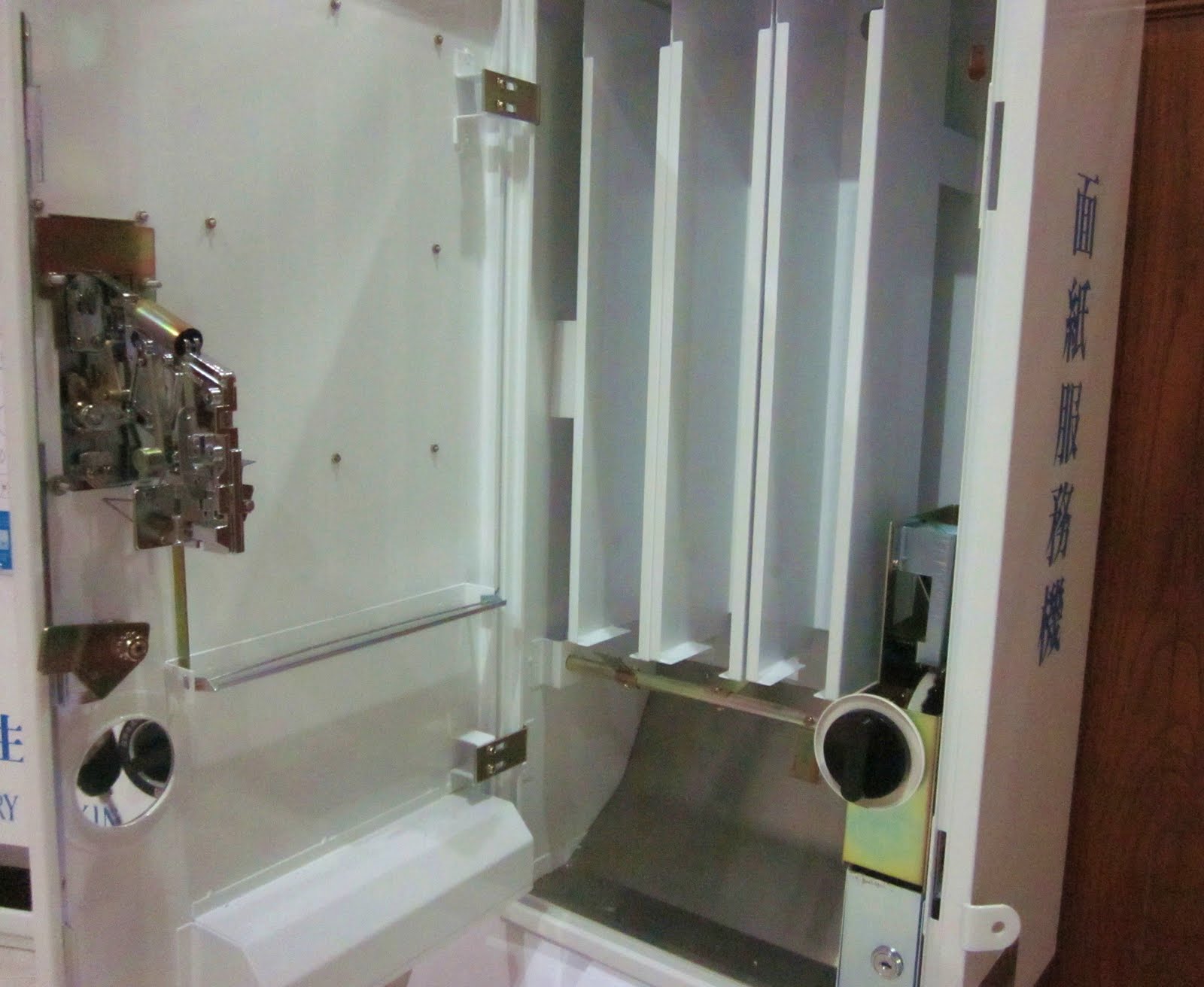 WANGLER SERVICES PTE LTD: Vending Machines for Tissue Paper or Sanitary Pad