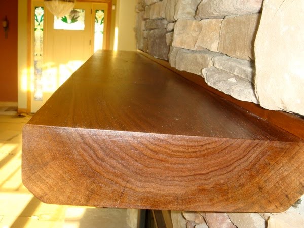 pas au-delà: custom floating walnut mantel shelf