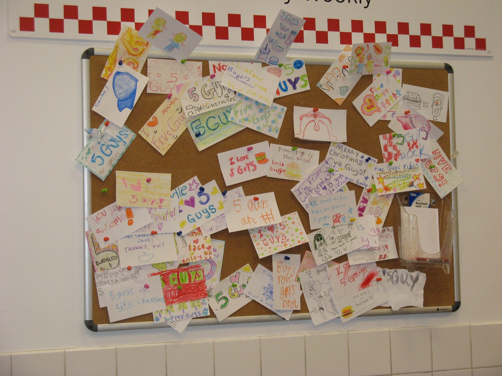 Five Guys has a bulletin board for customer art. Can you see where this ...