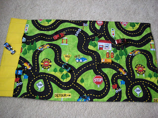 in simplest form •: road playmat