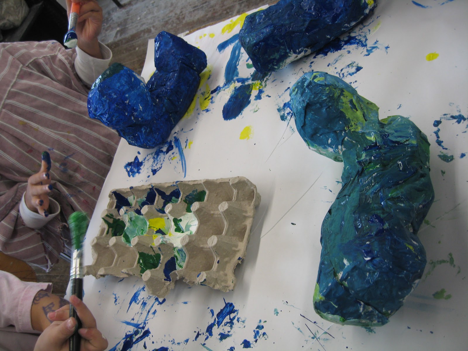 Color, collage, and much more: Paper Mache Peacocks