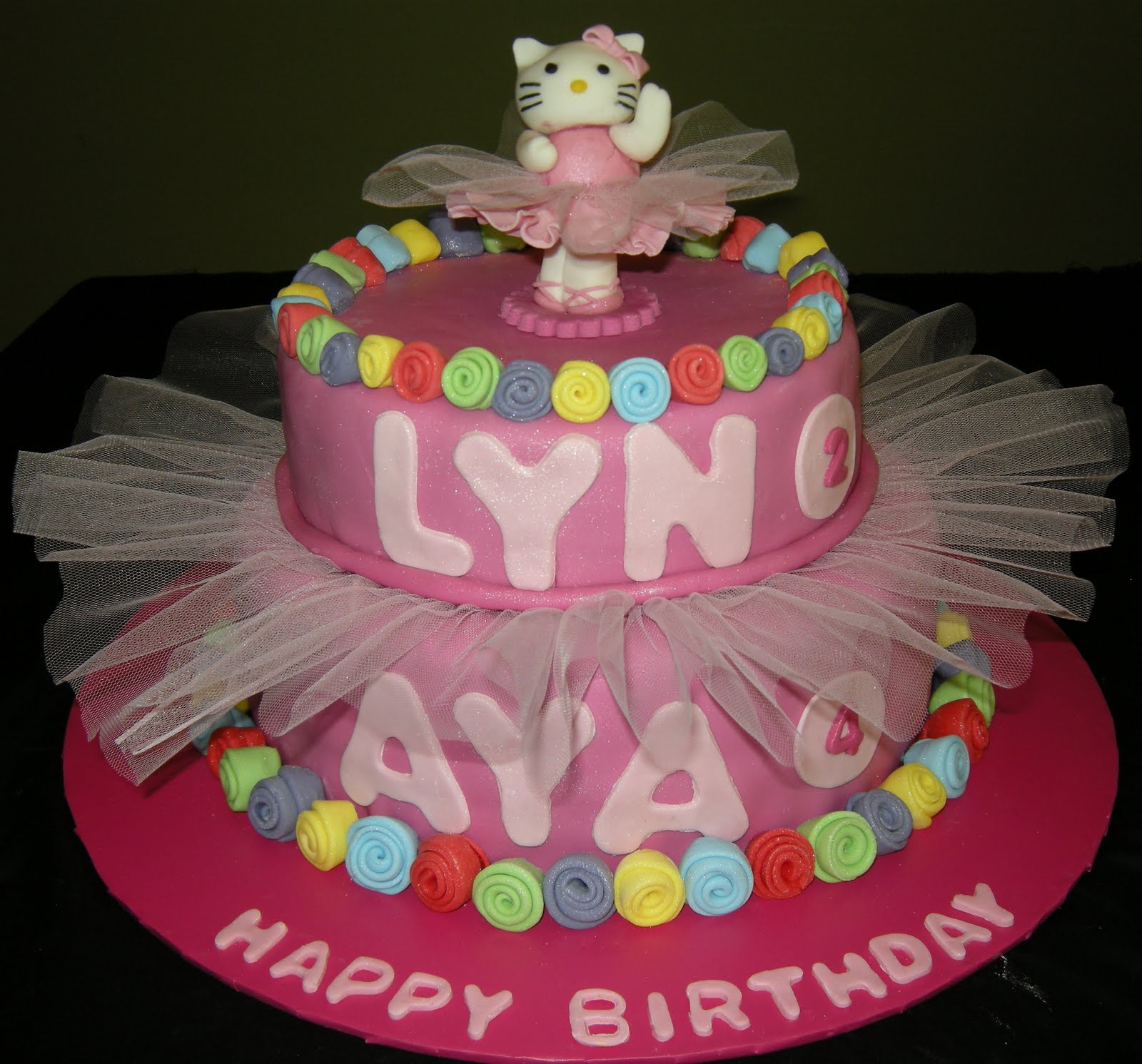 Harshi's Cakes & Bakes: Hello Kitty 2 Tier Cake with Rose Buds