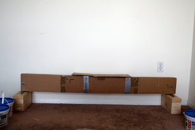 Assembling a Molecular Architecture: Laminated Corrugated Cardboard Beam