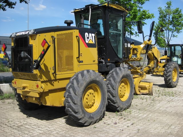 AutoGreder Caterpillar 120M NOU, ORE DEMONSTRATIVE