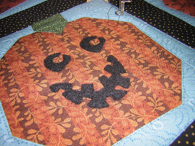 Kim's Big Quilting Adventure: Happy Jacks--Quilting and Adding Faces