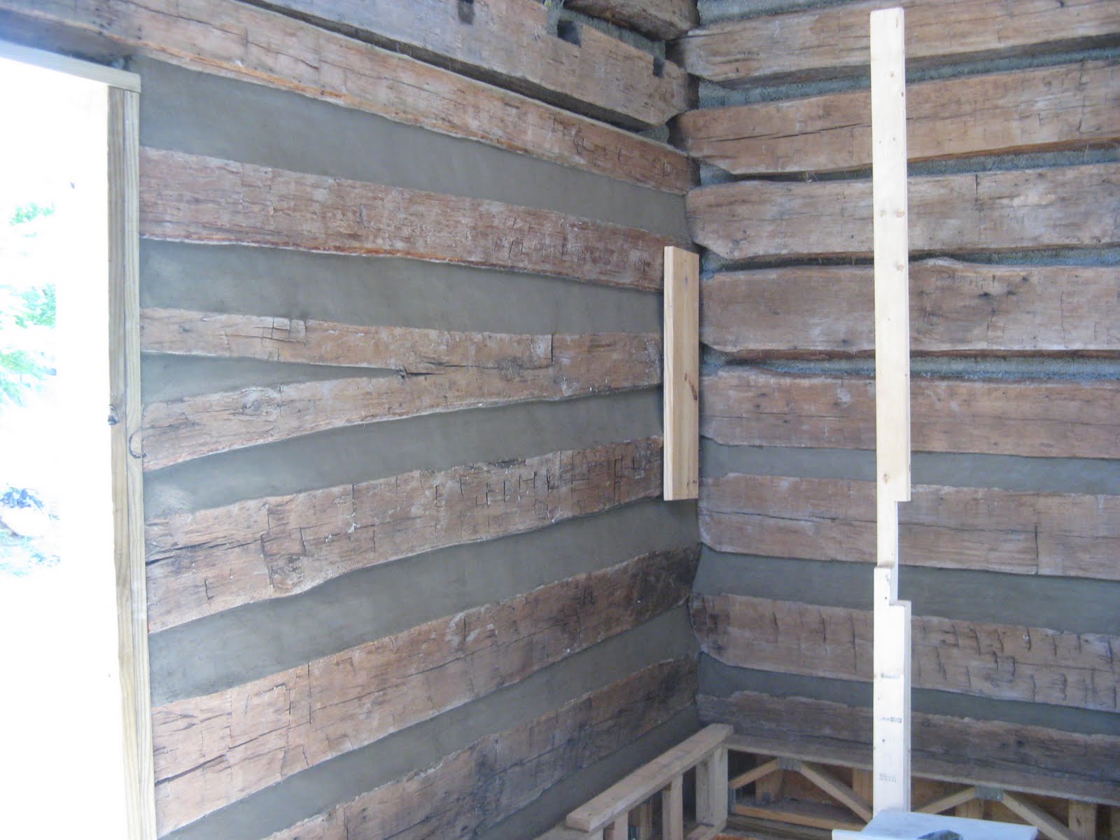 Old Log Cabin Revival: Inside Chinking and Framing in the Gable